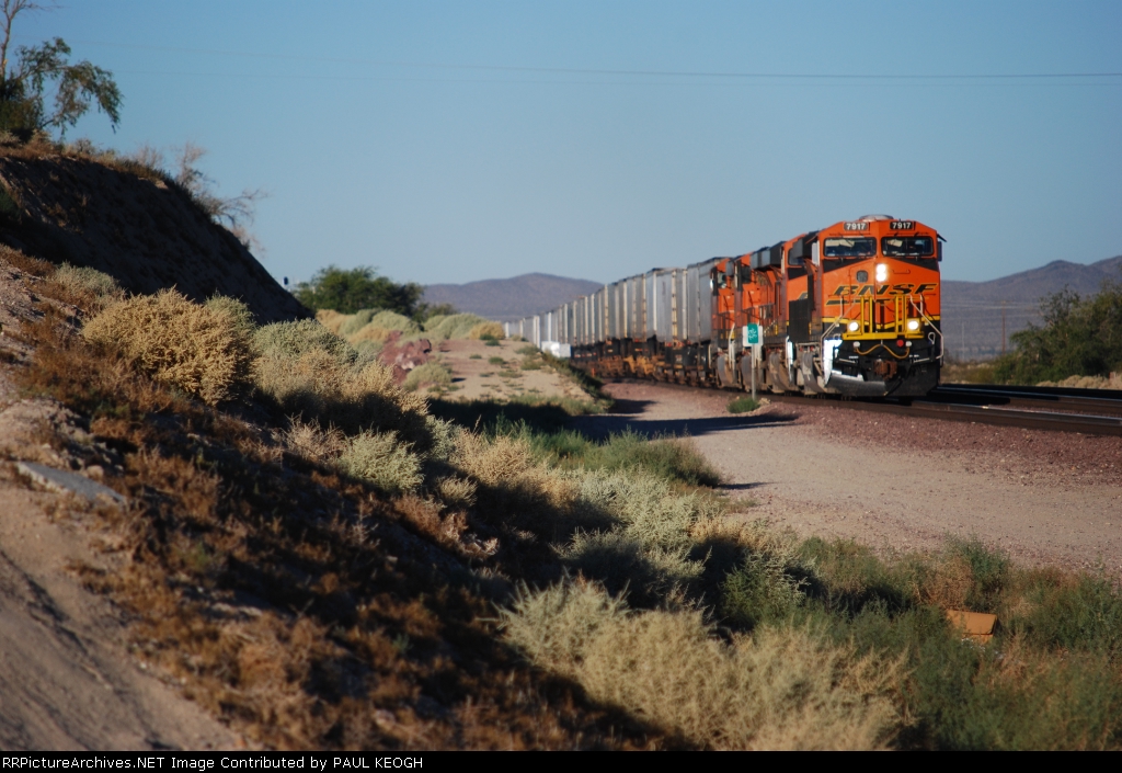 bnsf 7917 rounds the curve at Lenwood, Ca slowing down to 30 MPH for the final into BNSF Barstow ...